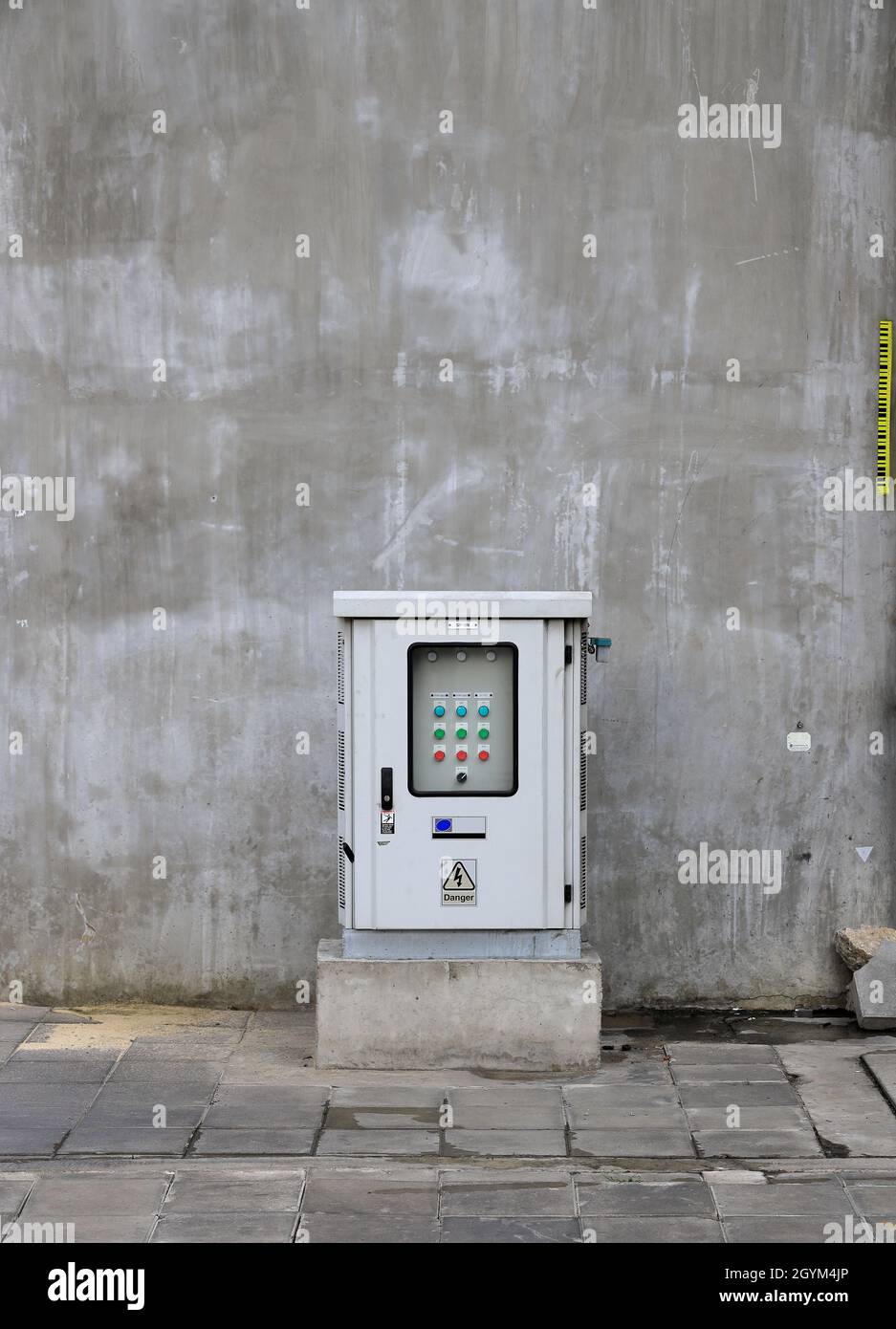 electrical control box, large wall mounted box ion a concrete wall and ...