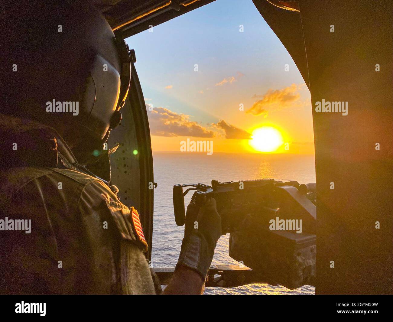 Spc. Justin Hillis from 2nd Battalion, 25th Aviation Regiment looks at ...