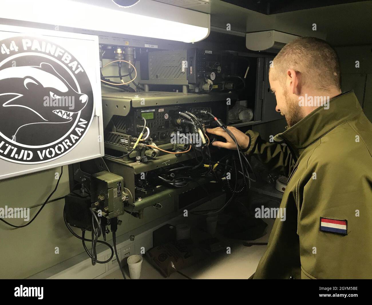 OR-6 Tiego Seerden of the Netherlands Army communicates with U.S. Army ...