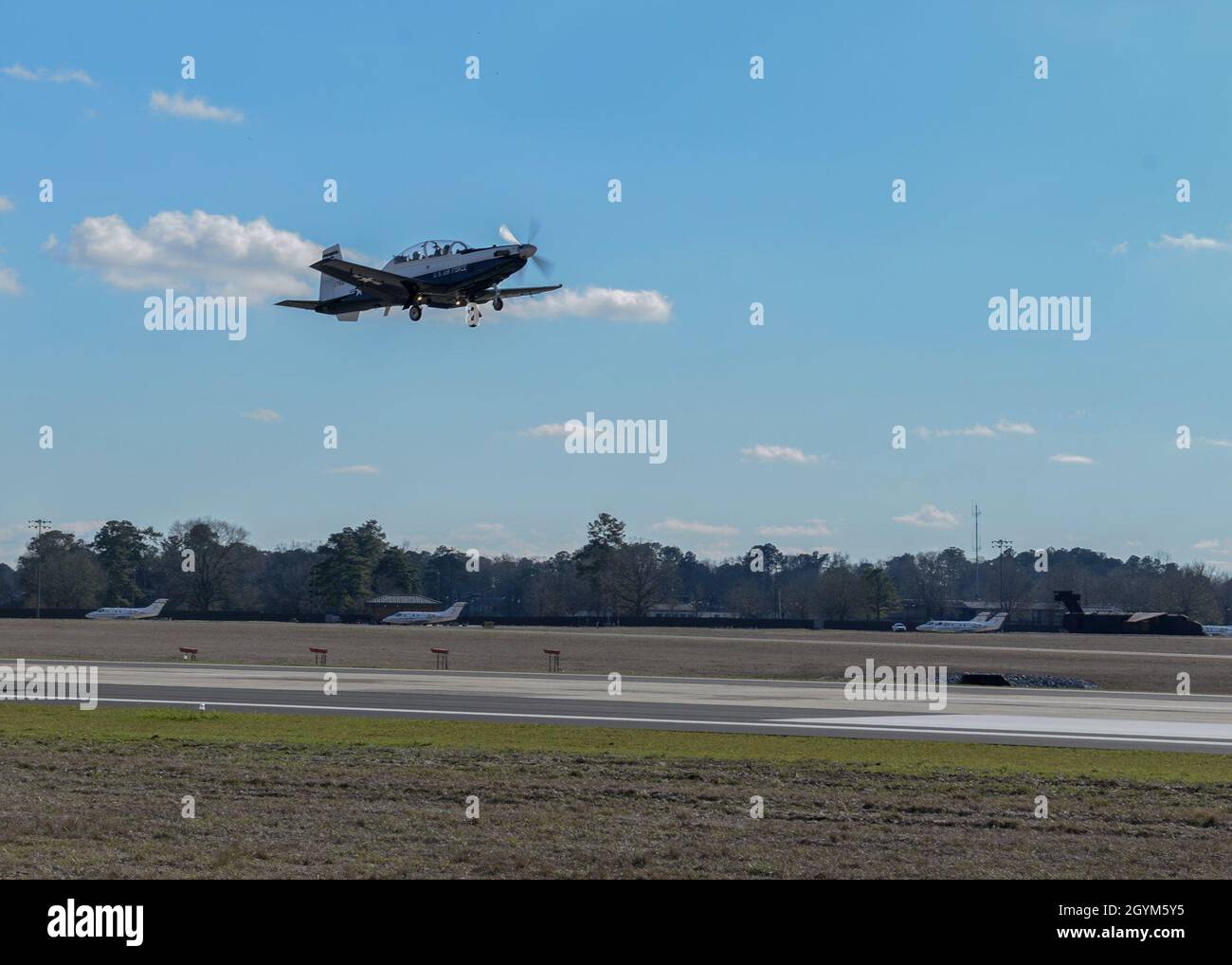 A T-6 Texan II takes off of the flightline with a student pilot and ...