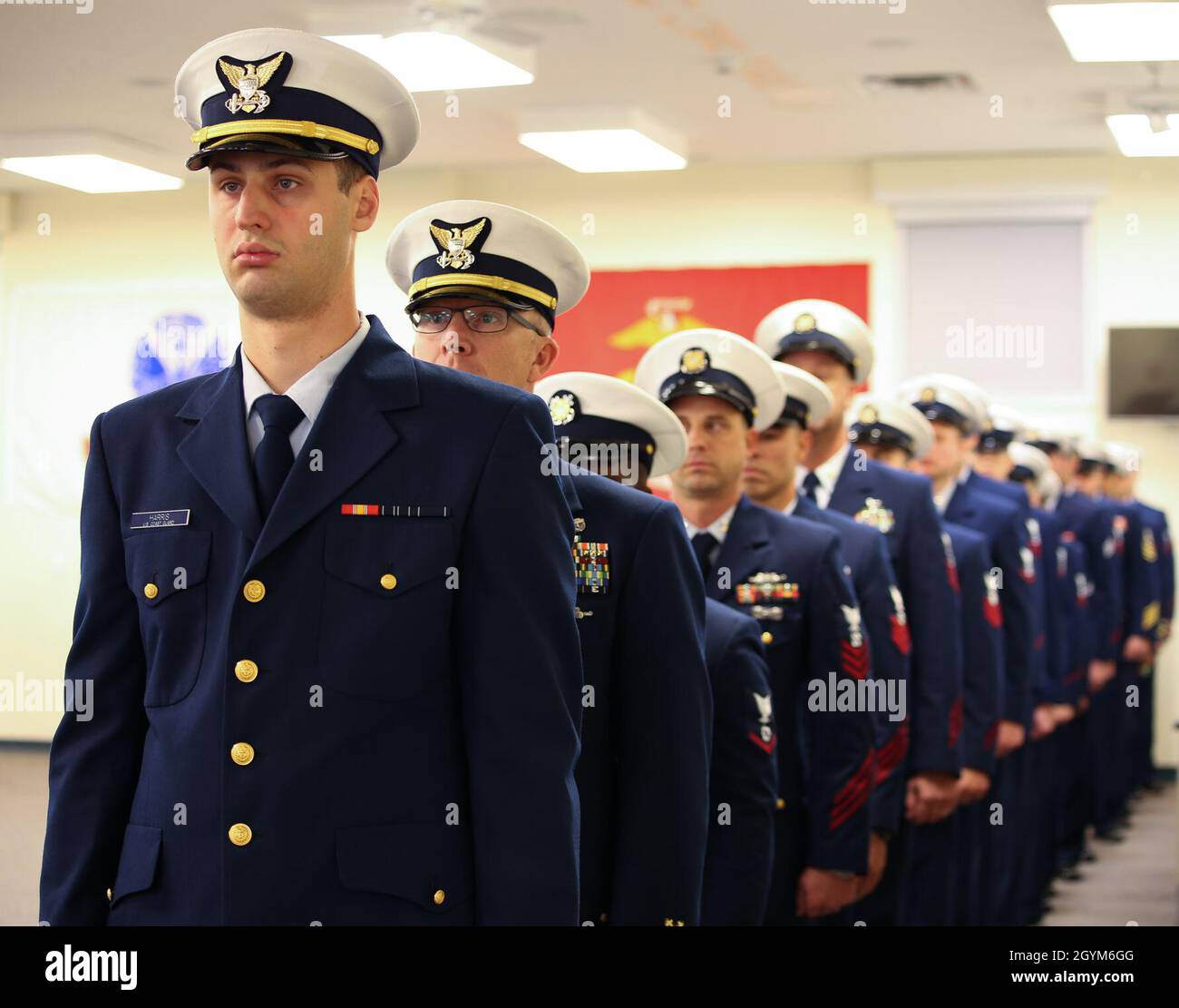 Coast Guard members stand at attention during the 40th anniversary ...