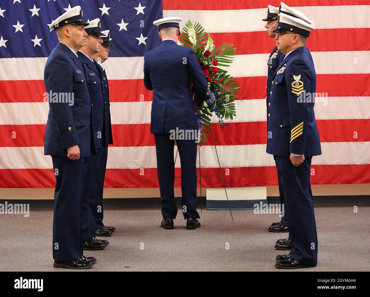 Coast Guard members pay tribute to the members who lost their lives on ...