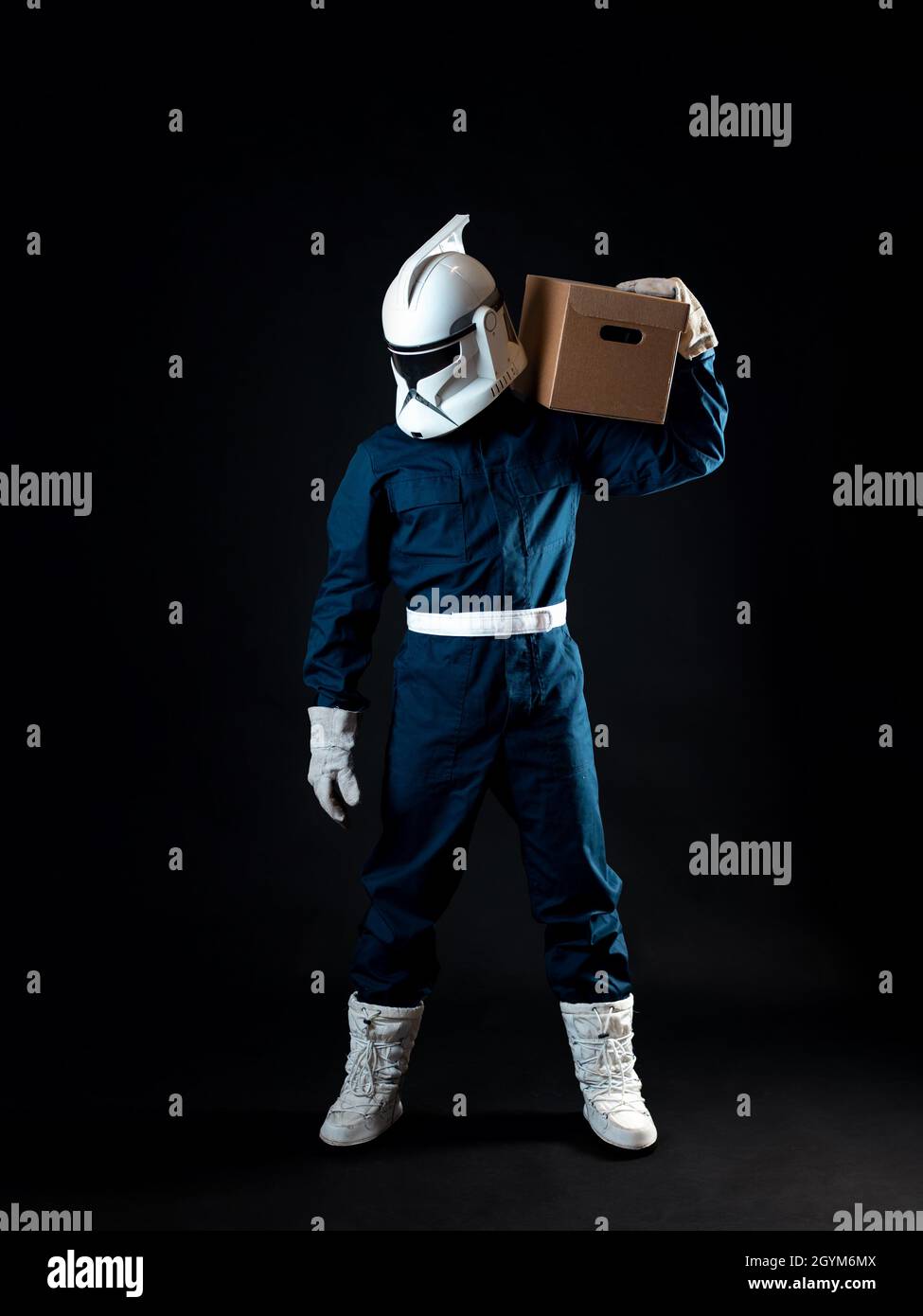 A space loader, a courier of the future delivered your parcel. A man in ...