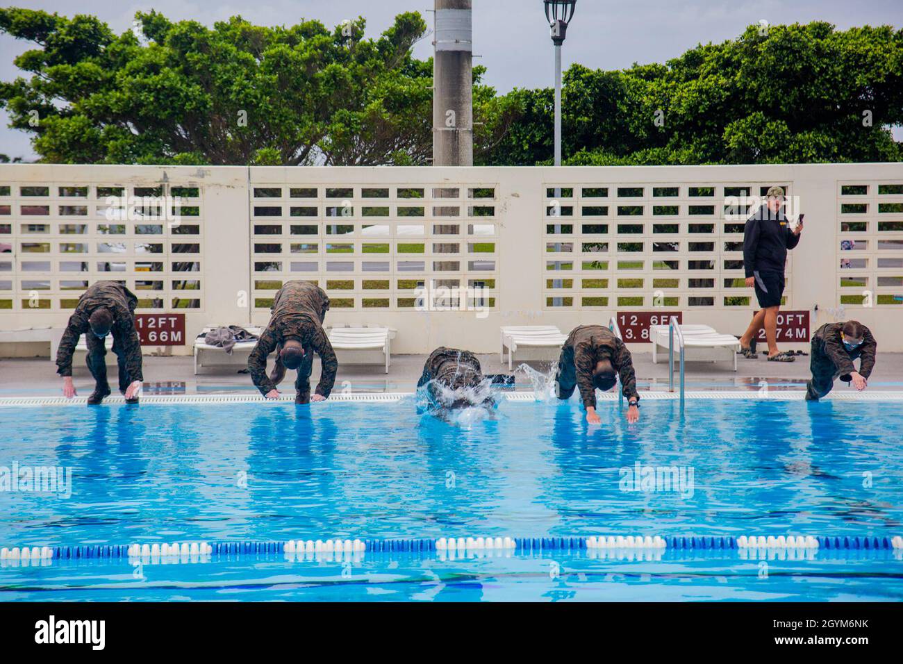 U.S. Marines dive into the pool during Water Survival Advanced (WSA ...