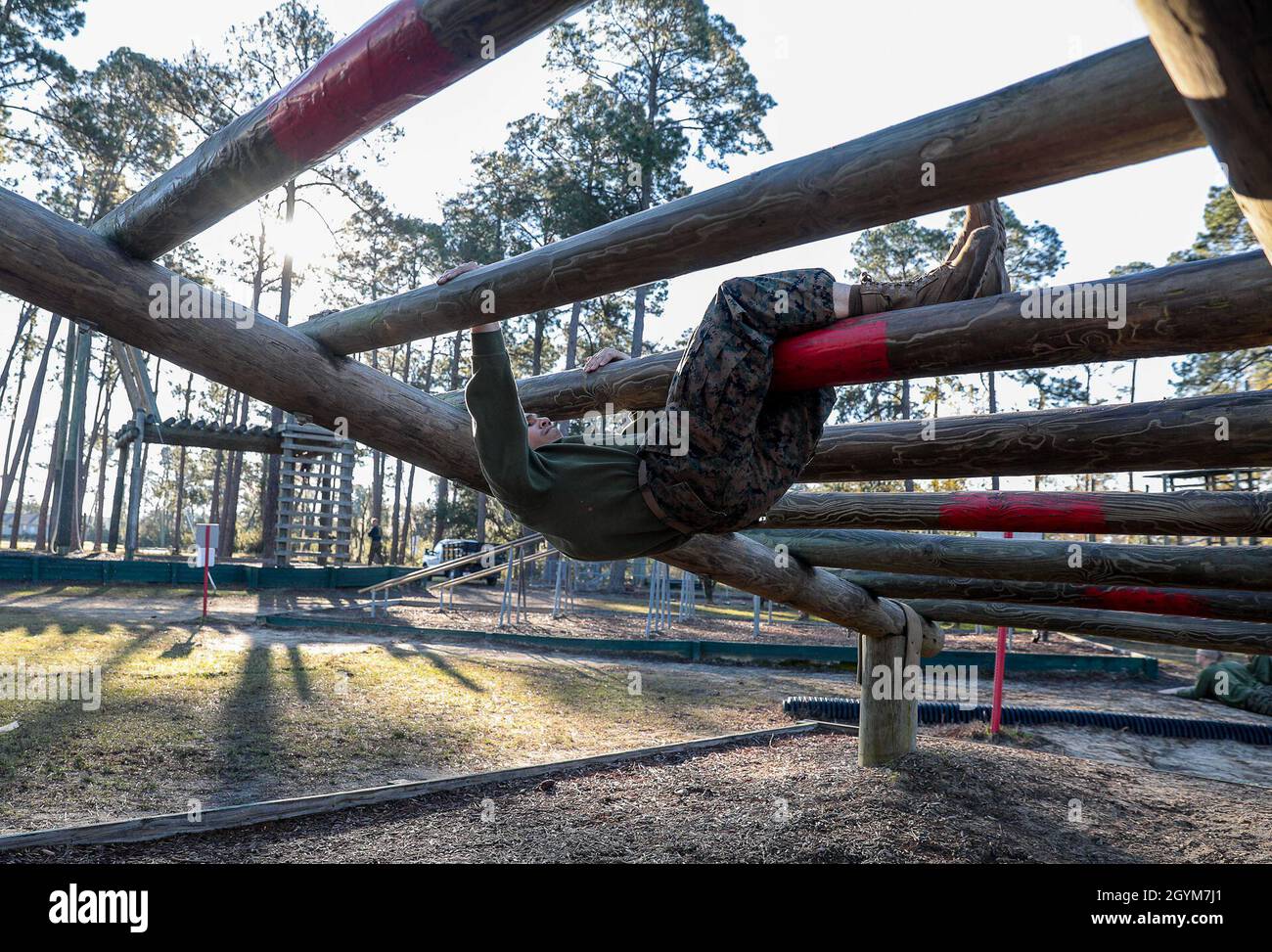 A recruit with Kilo Company, 3rd Recruit Training Battalion, navigates ...