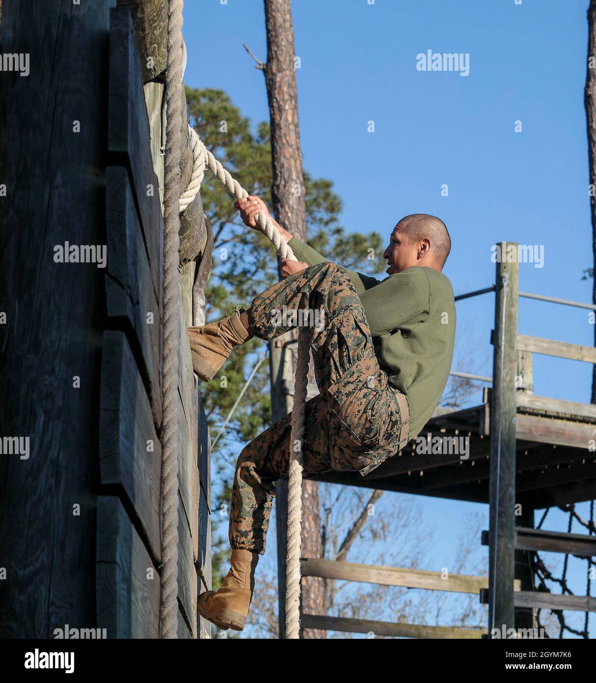 A recruit with Kilo Company, 3rd Recruit Training Battalion, navigates ...