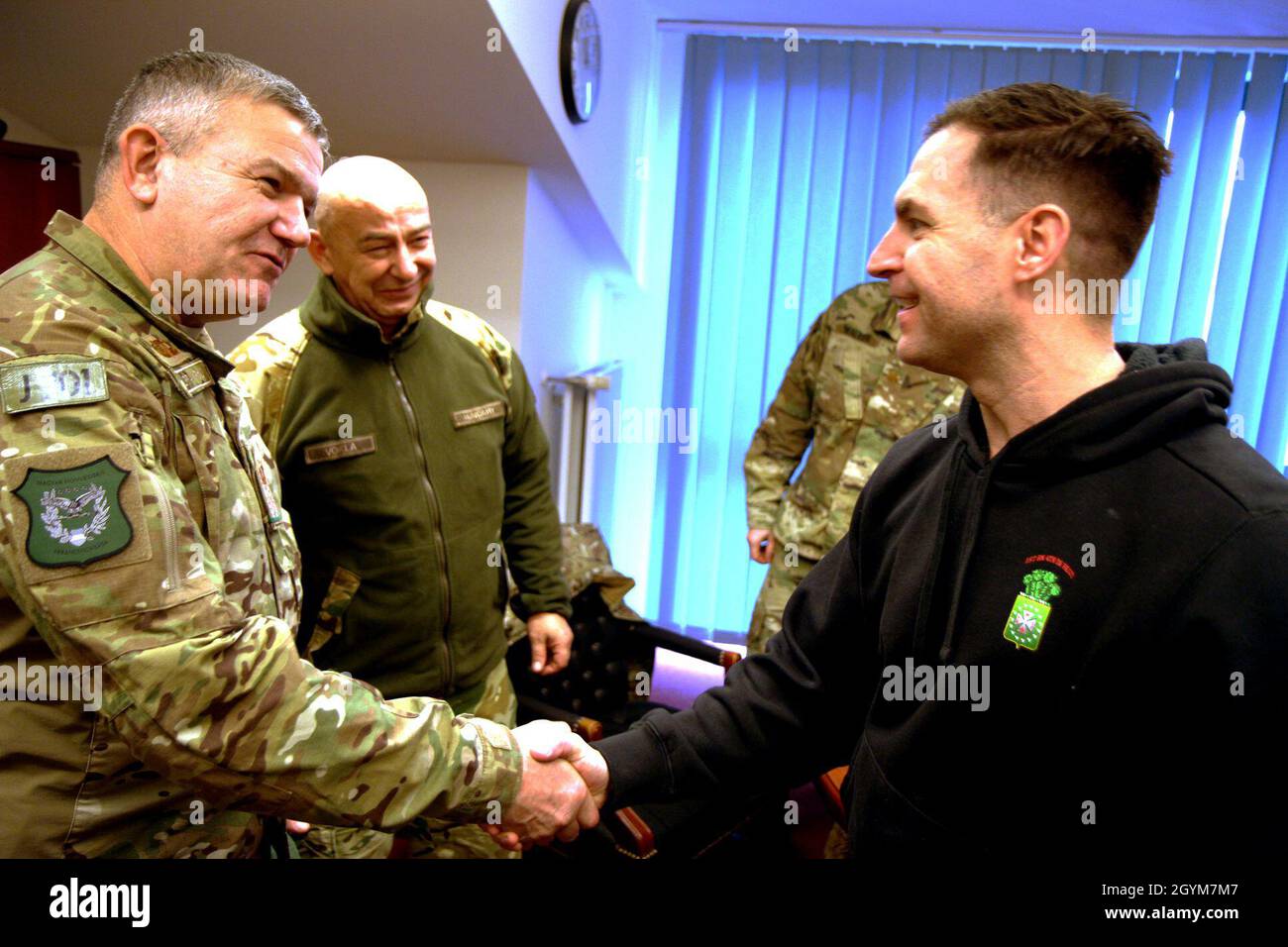 Lt. Col. Kevin Ryan, 1st Battalion, 4th Infantry Regiment presents a ...