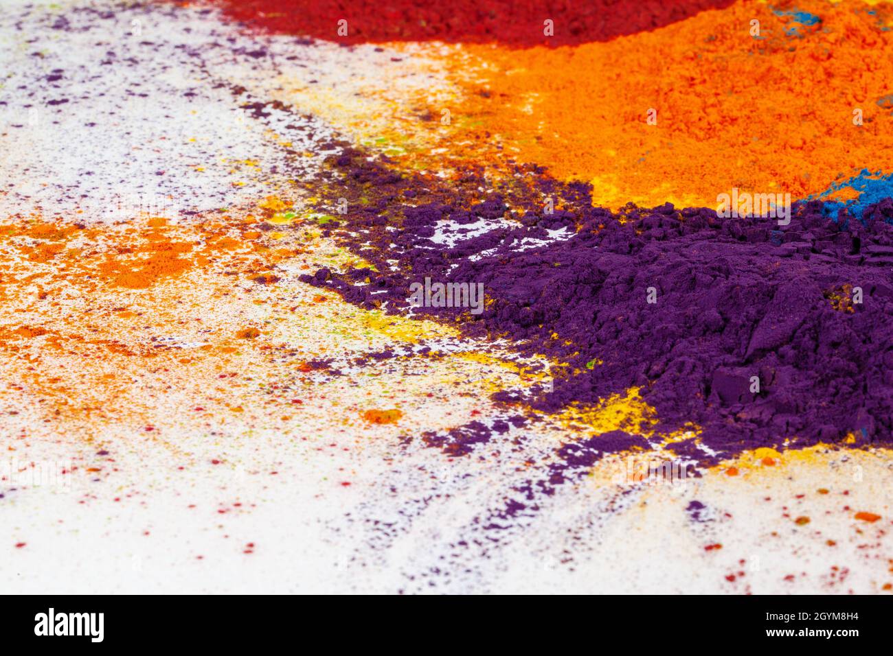 Colorful background made of Indian colorful dyes Stock Photo - Alamy