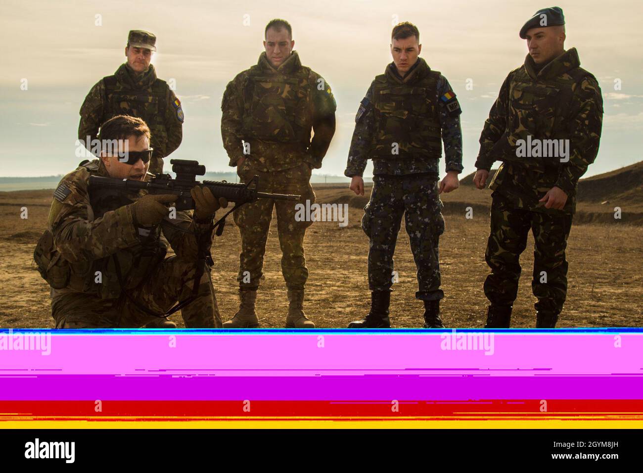Romanian armed forces members receive preliminary marksmanship ...