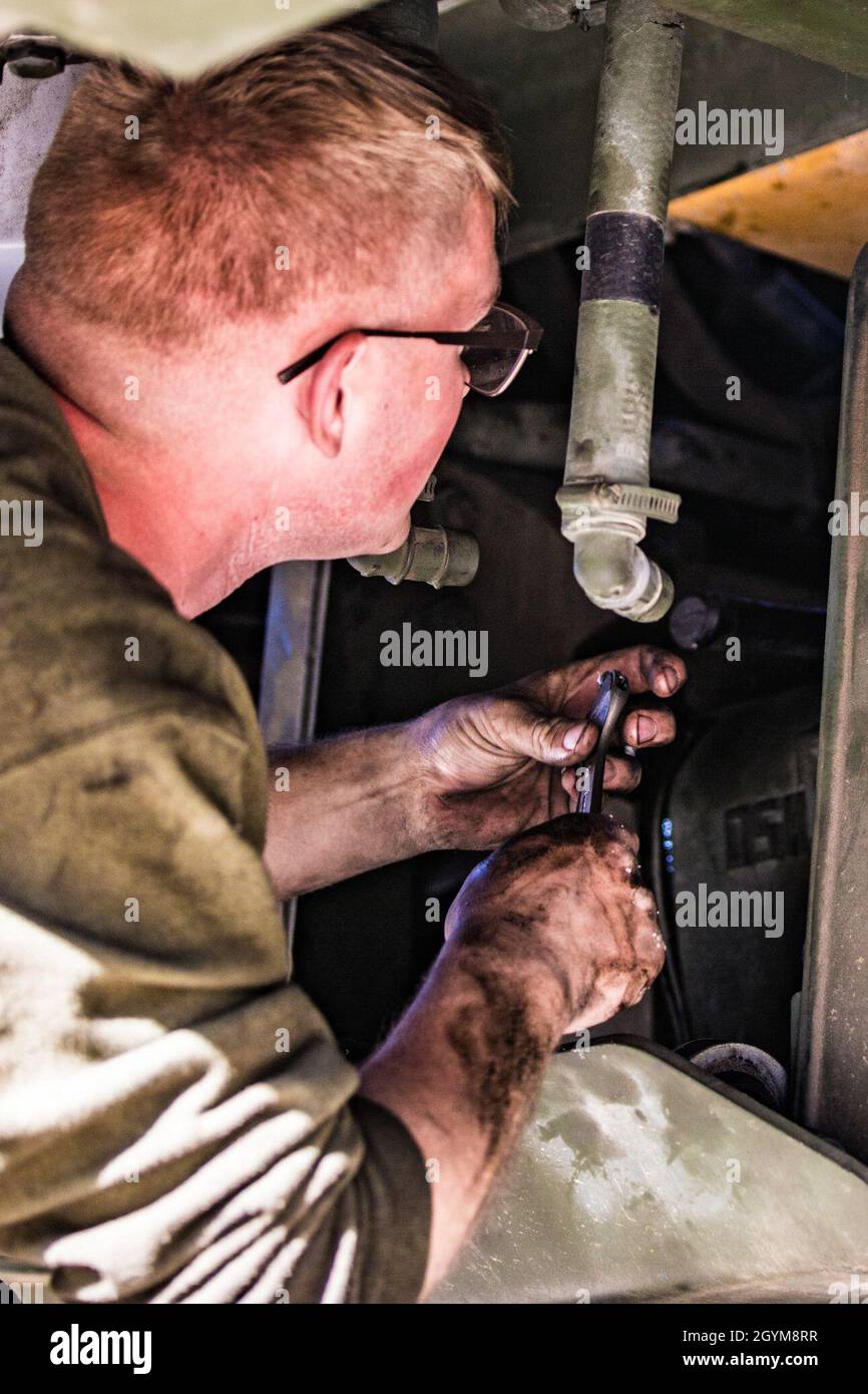 U.S. Marine Corps Lance Cpl. Murray Stuck, a motor transport mechanic ...