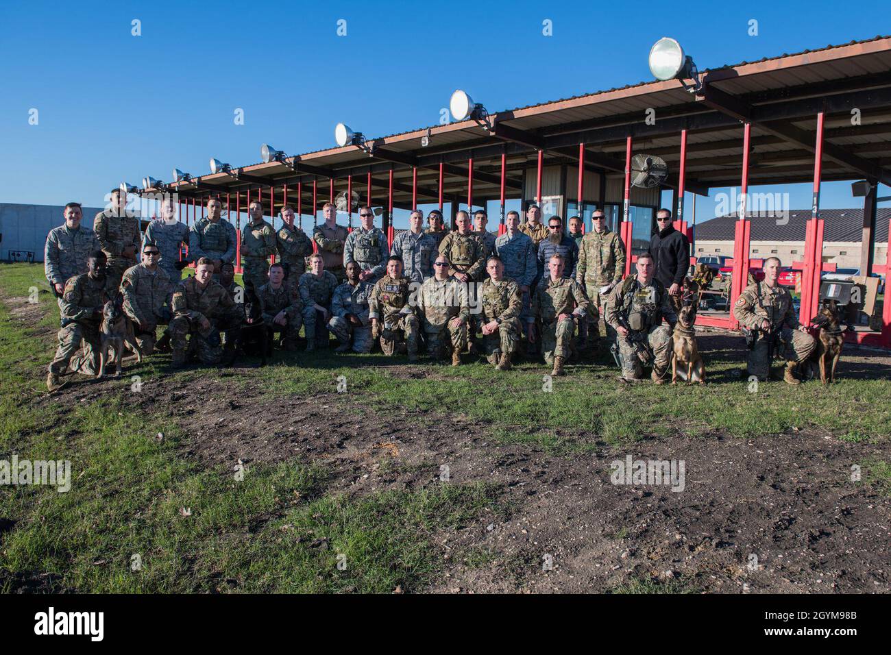 U.S. Air Force Security Forces Airmen pose for a group photo before the ...