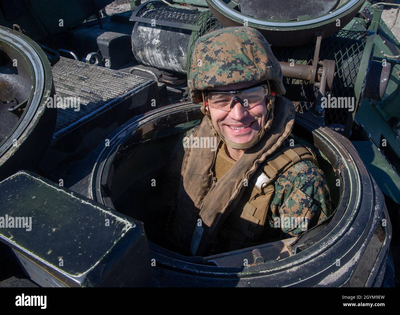 U.S. Navy Cmdr. Damon Jensen, a dentist with 2nd Dental Battalion, 2nd ...