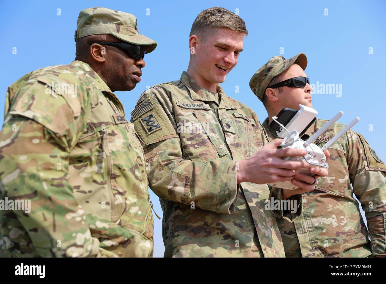 U.S. Army Sgt. 1st Class Barry Mcmanus, left, Spc. Dalton Williams ...