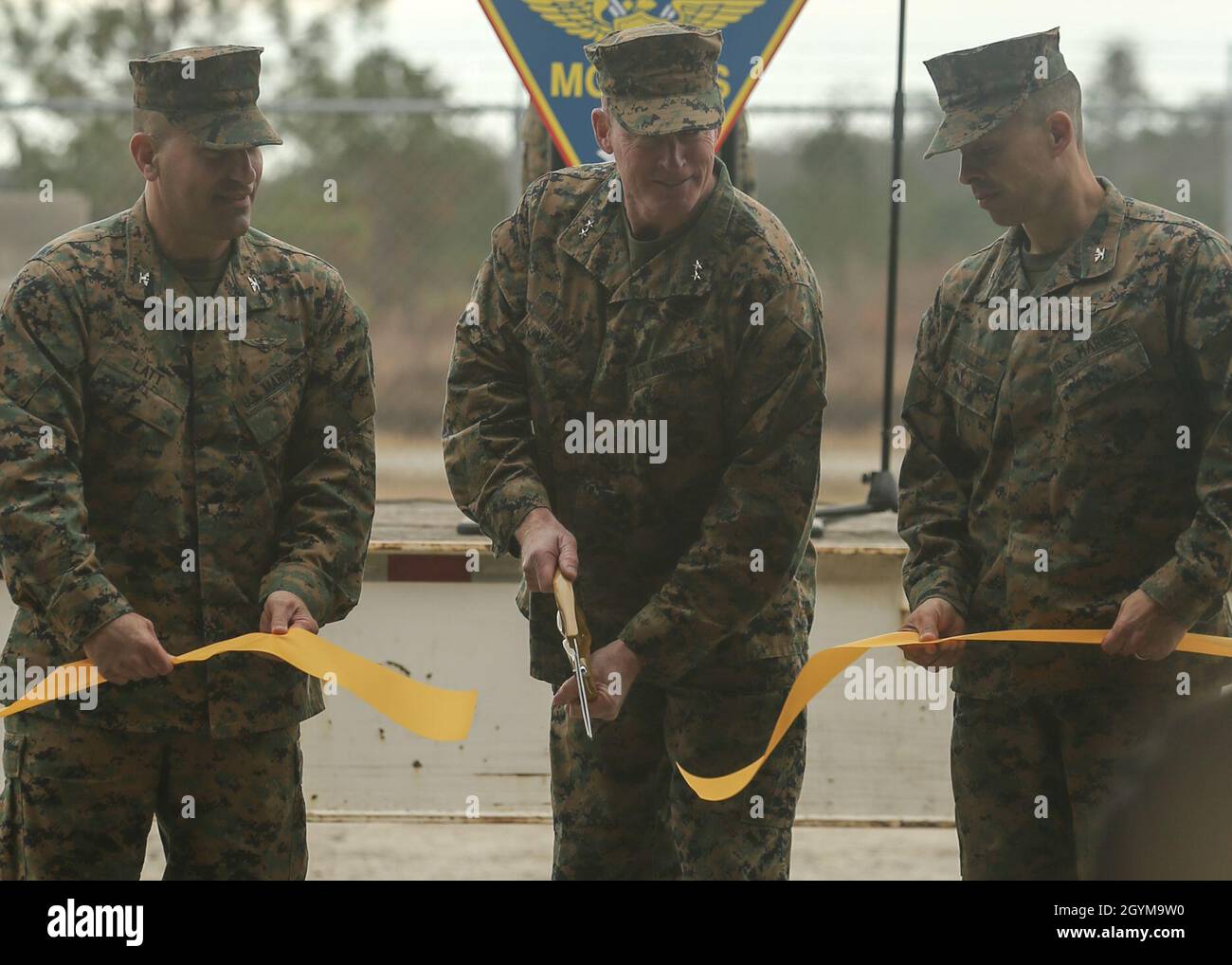 (Left) Col. Frank N. Latt, 2nd Marine Aircraft Wing, (middle) Assistant ...