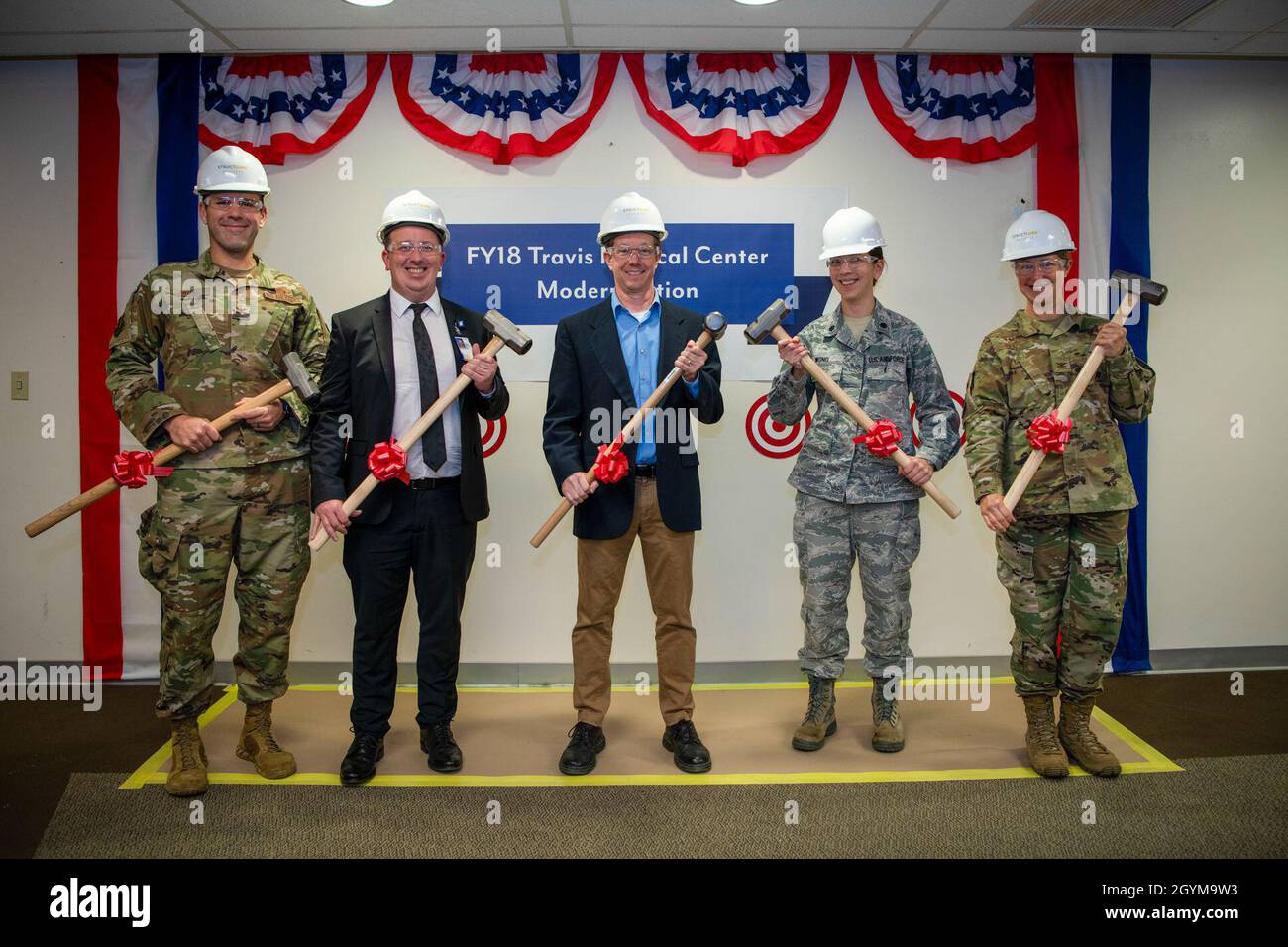 U.S. Air Force Col. Zachery Jiron, left, 60th Air Mobility Wing vice ...