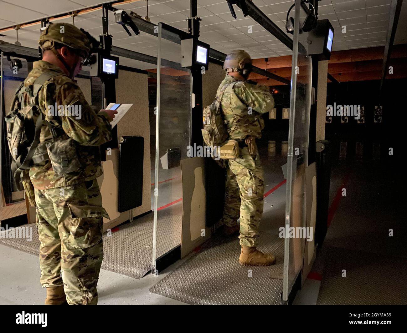 Maj. Kirk Freeman and Sgt. 1st Class Jon Jeu, National Guard ...