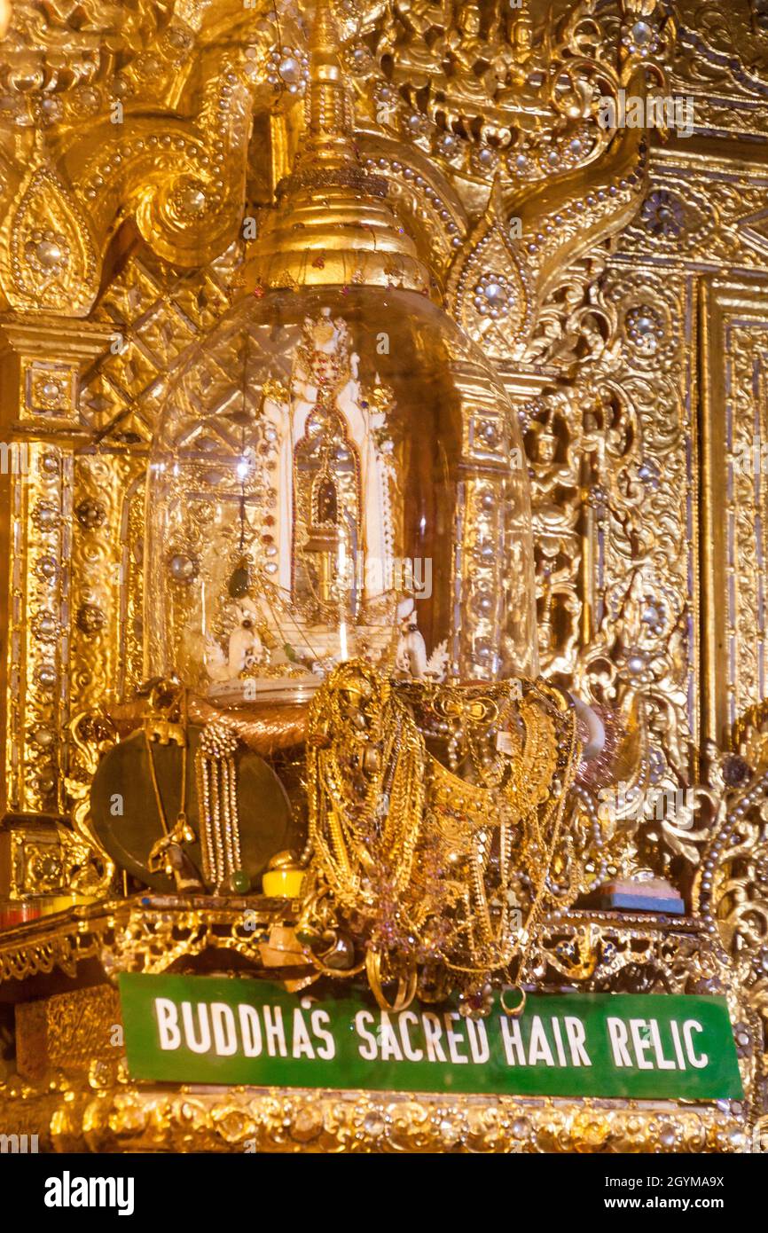 YANGON, MYANMAR - DECEMBER 15, 2016: Buddha sacred hair relic in ...