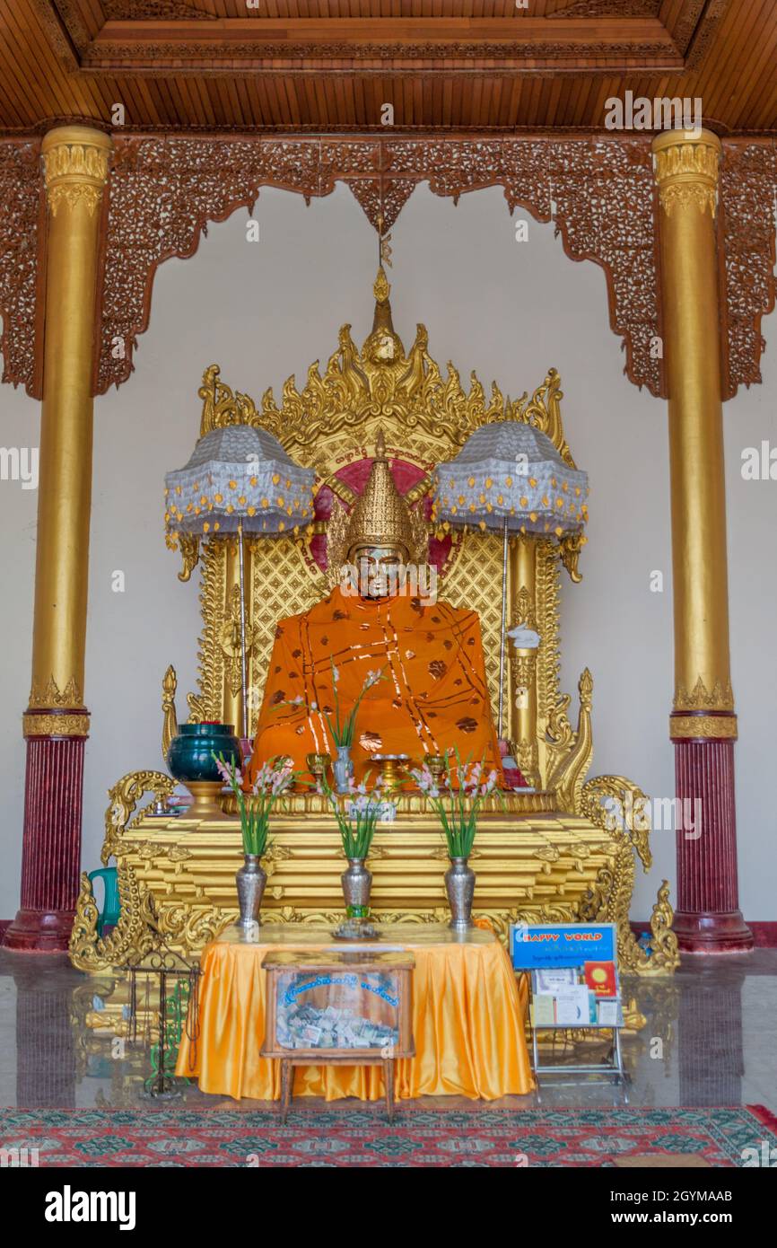Buddha statue at Botataung Paya pagoda in Yangon, Maynmar Stock Photo ...