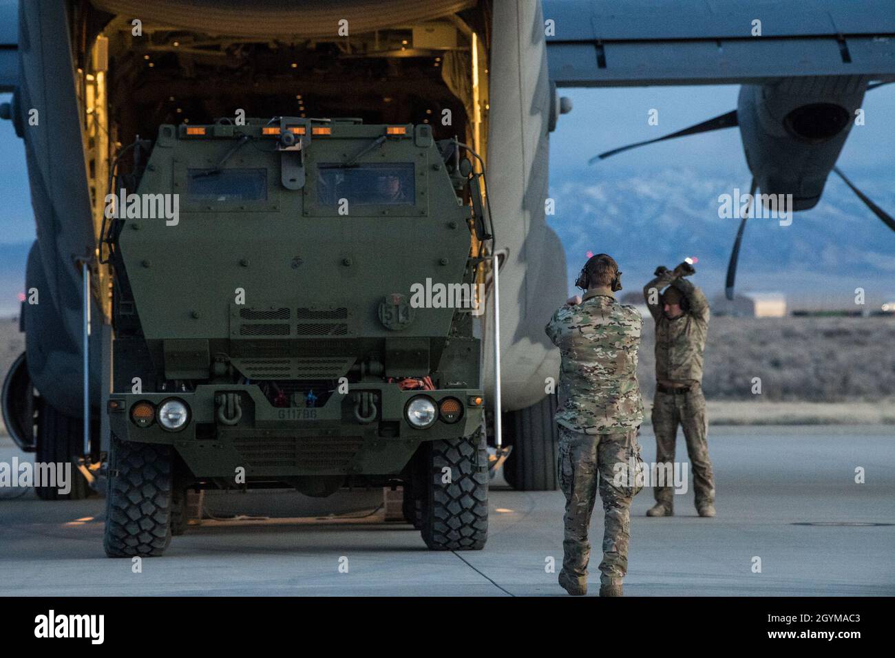 U.S. Marines and loadmasters with the 9th Special Operations Squadron ...
