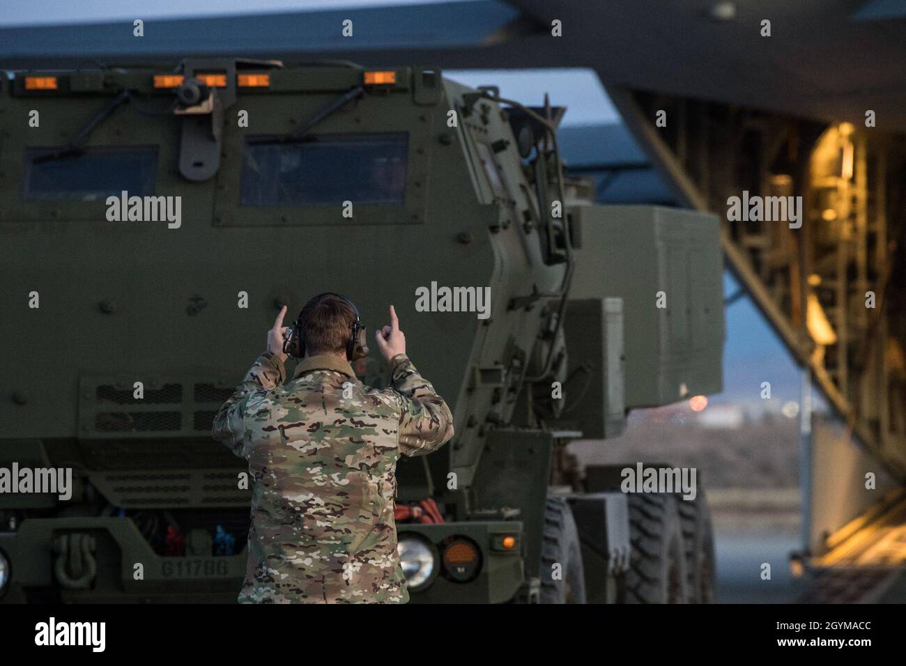 U.S. Marines and loadmasters with the 9th Special Operations Squadron ...
