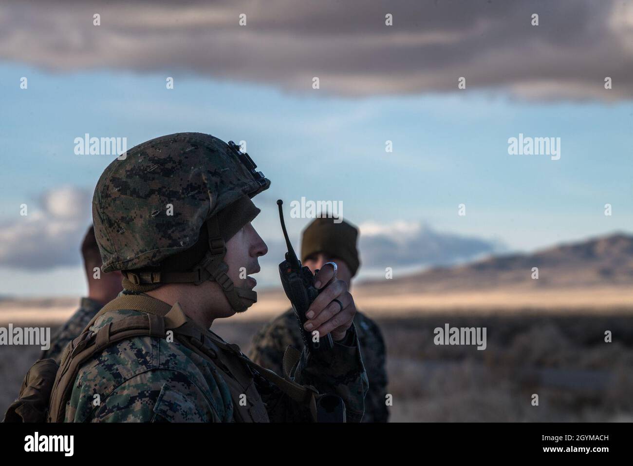 A U.S. Marine radios his team in the M142 High Mobility Artillery ...