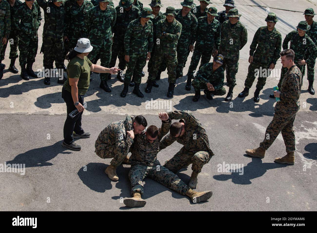 U.S. Marines demonstrate a two-man support carry during a supplemental ...