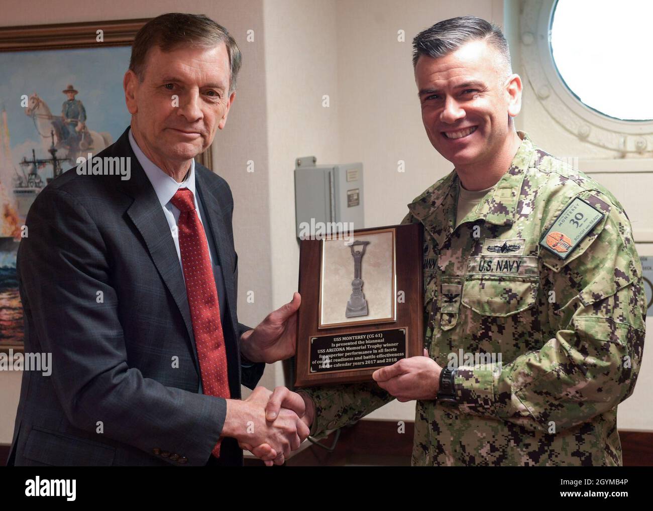 Director, Navy Staff, Mr. Andrew Haeuptle presents the USS Arizona ...