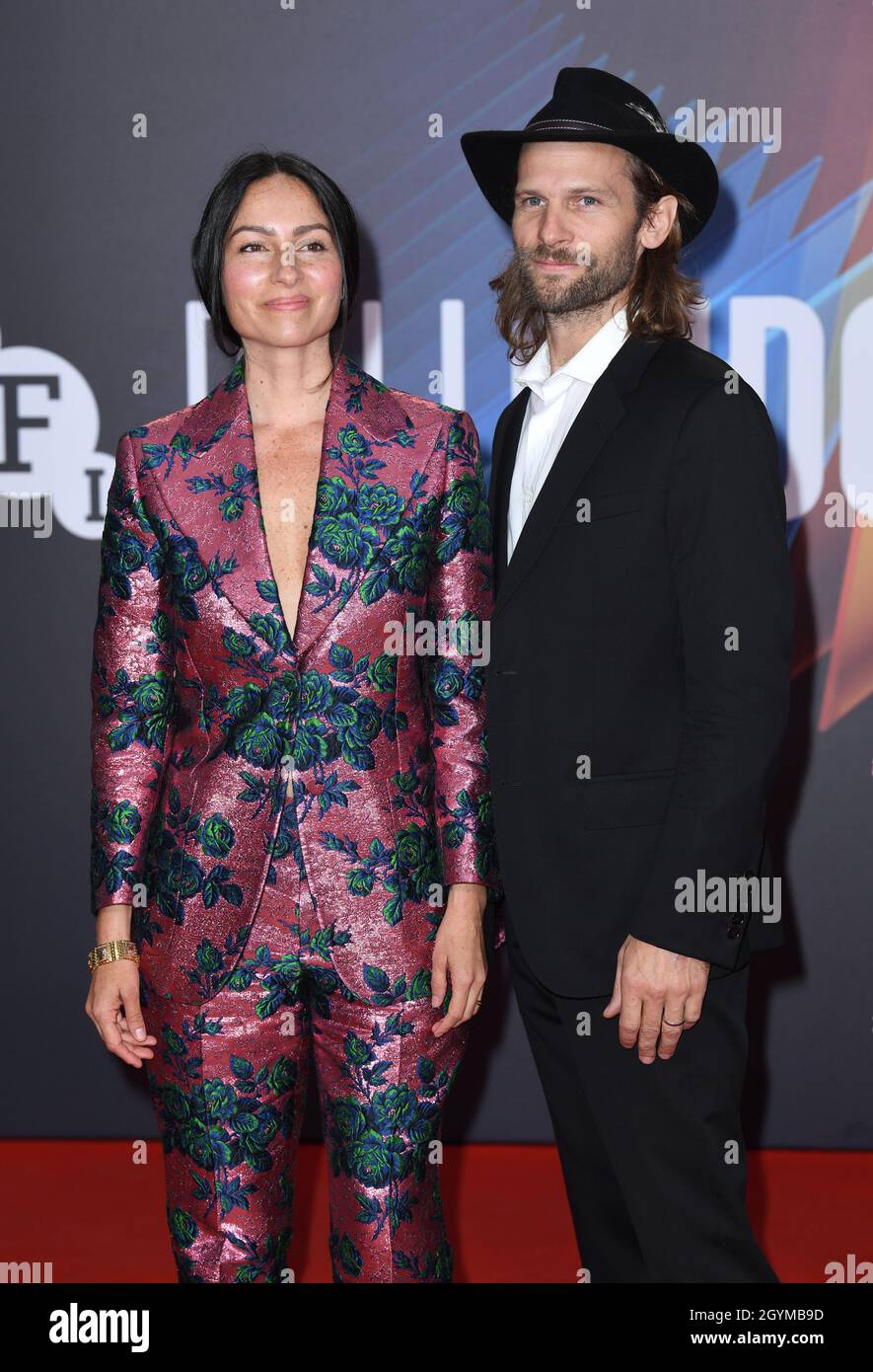 London, UK. 08 October 2021. Byron Broadbent and Gala Botero arriving ...