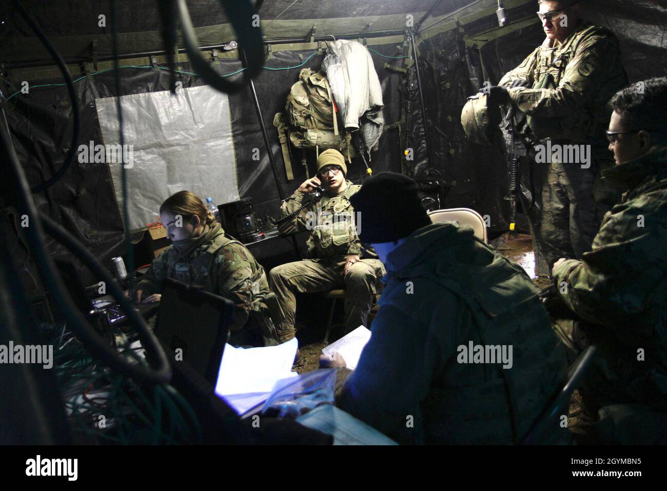 Soldiers of the 1-147th Field Artillery Battalion gather mission ...
