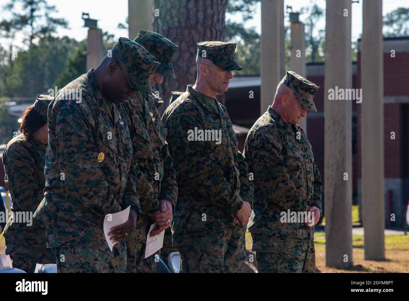 From left, U.S. Navy HMCM Kinkela H. Kuedituka, Command Master Chief ...