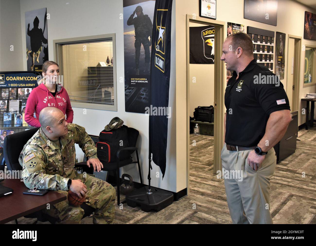 Sarah Dugan and Staff Sgt. Jonathon Johnson (both left), recruiter ...