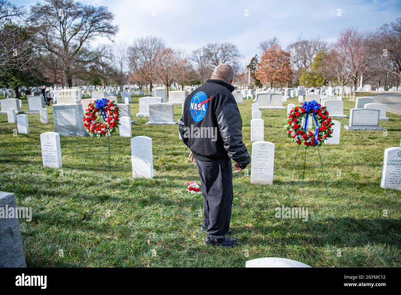 An attendance looks at the gravesites of Apollo 1 astronauts Virgil ...