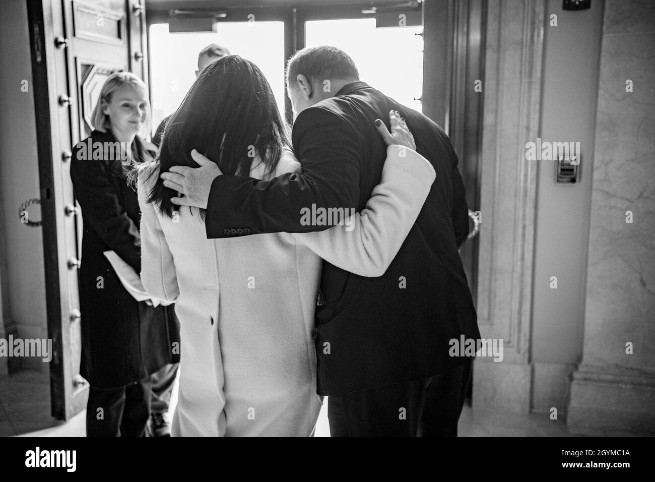 NASA Deputy Administrator Jim Morhard (right) receives a gift from ...
