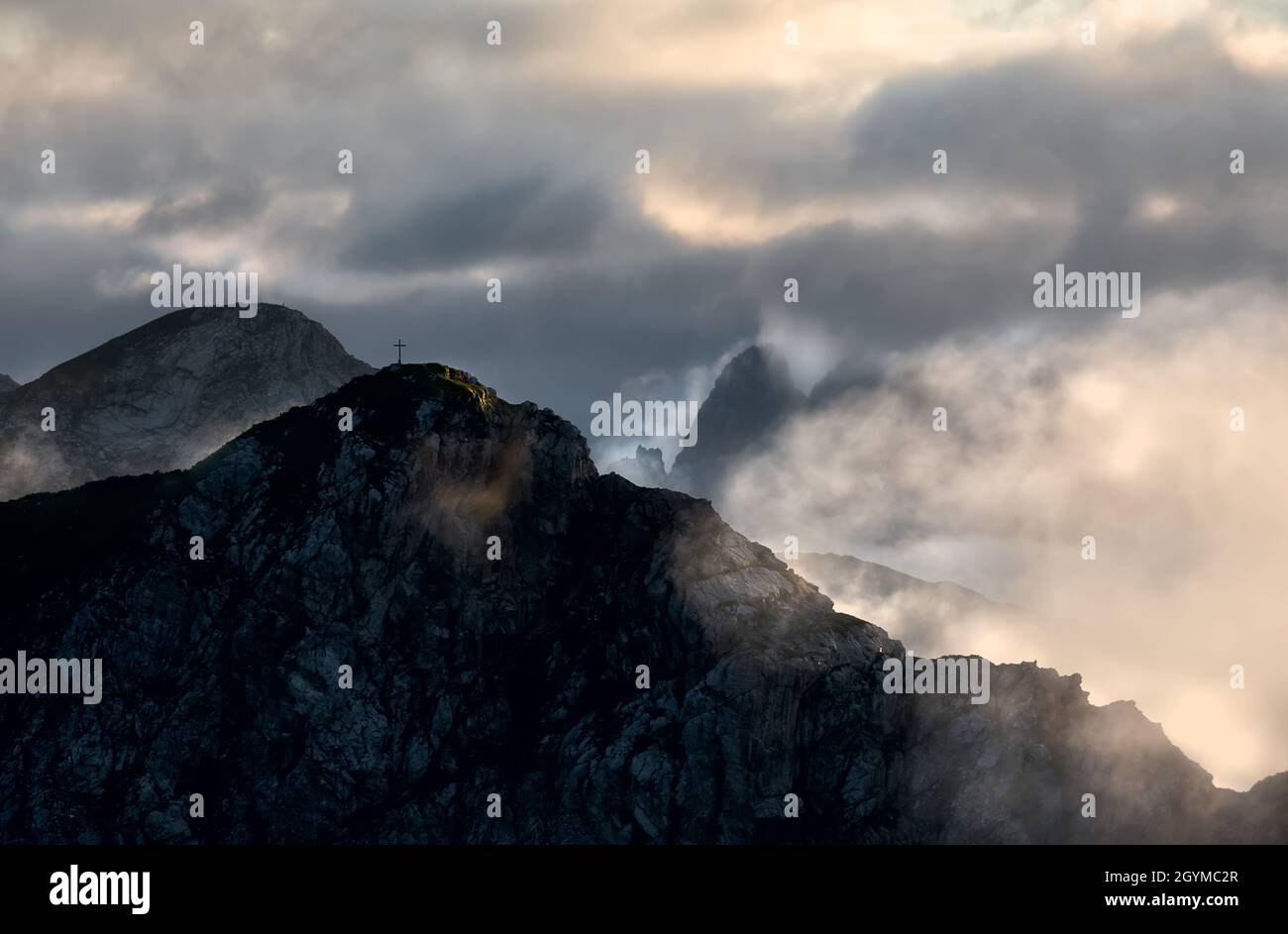 Clouded mountain top hi-res stock photography and images - Alamy