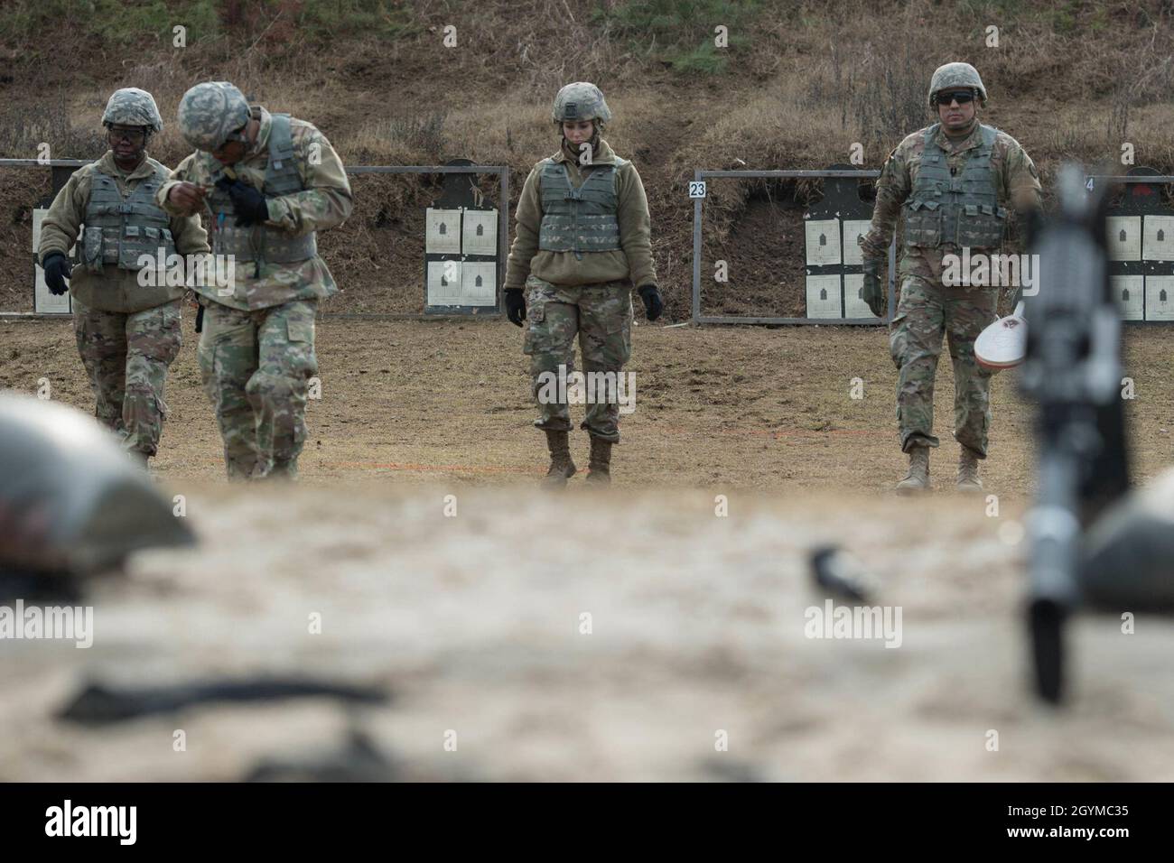 U.S. Army Soldiers assigned to the 93rd Signal Brigade walk to the ...