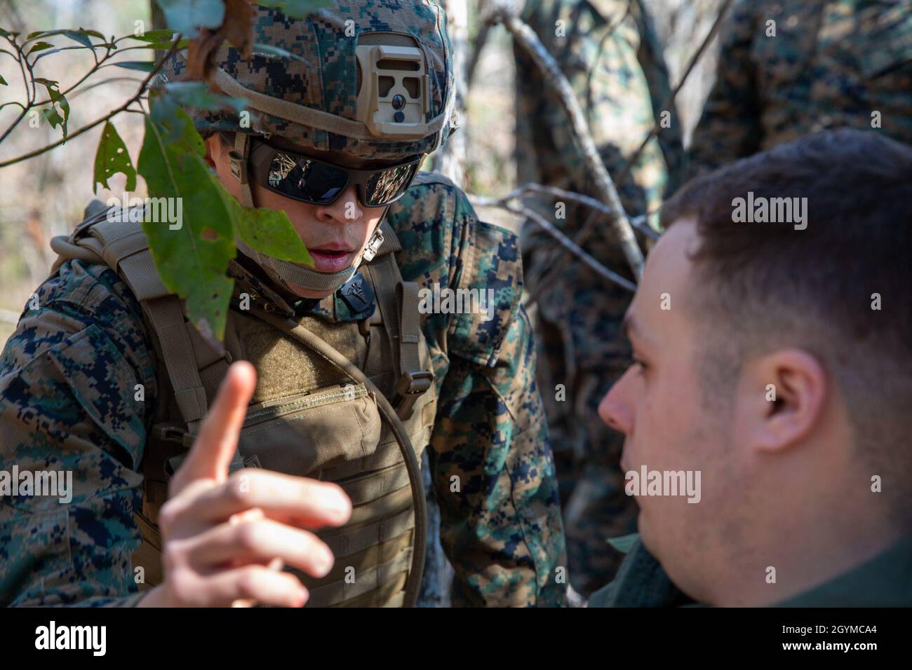 U.S. Navy Seamen Nicholas Xenakis, a corpsman with 3rd Battalion, 2nd ...
