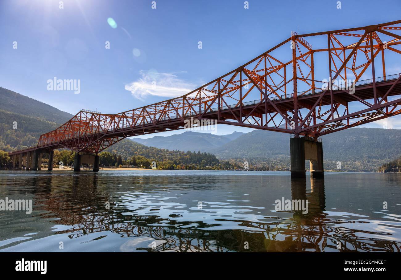 Big Orange Bridge over Kootenay River with Touristic Town Stock Photo ...