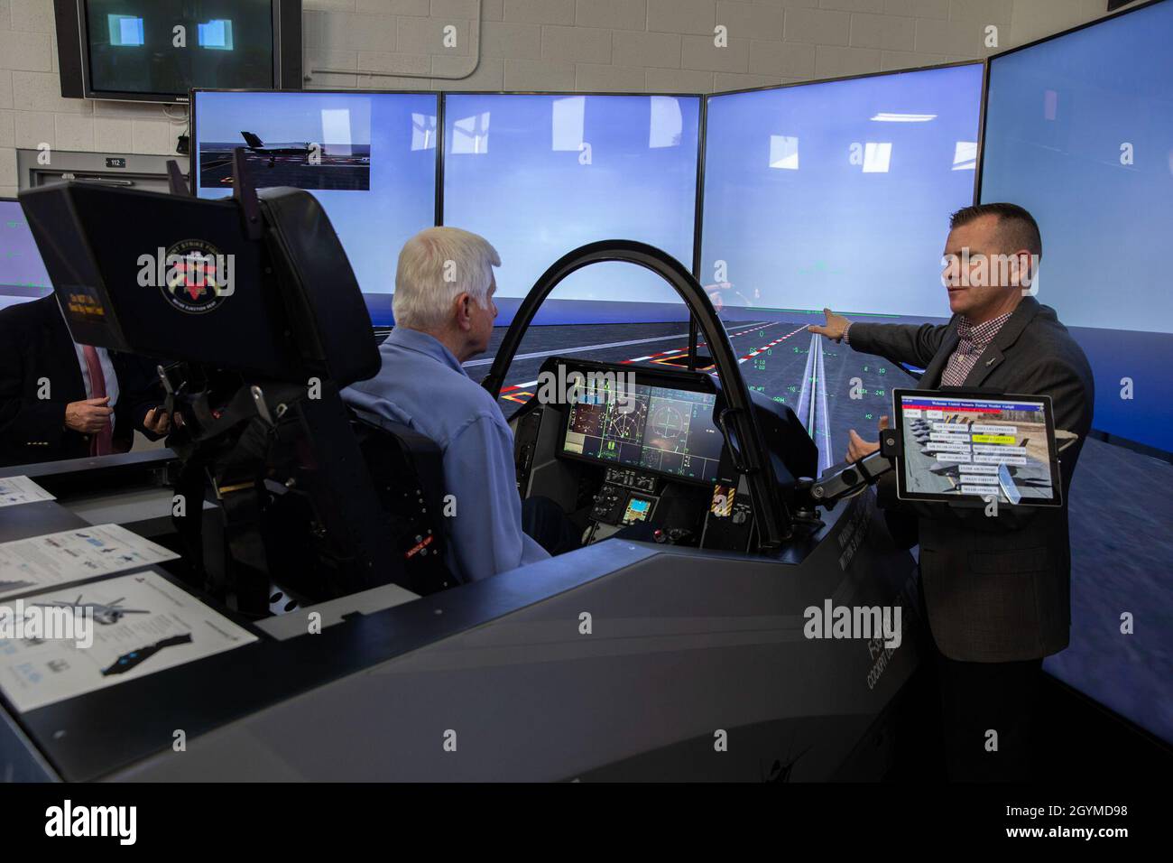 Lockheed Martin representatives use an F-35 simulator to demonstrate ...