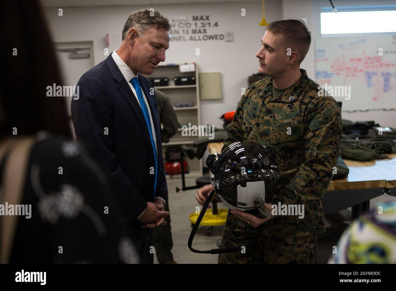 U.S. Rep. Scott Peters (left) talks with U.S. Marine Corps Staff Sgt ...
