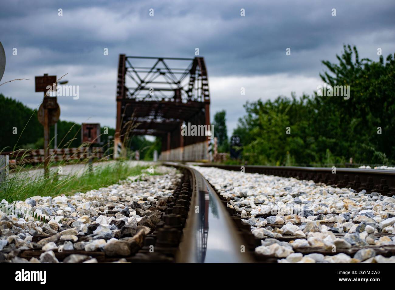 Train rails on cloudy sky Stock Photo - Alamy