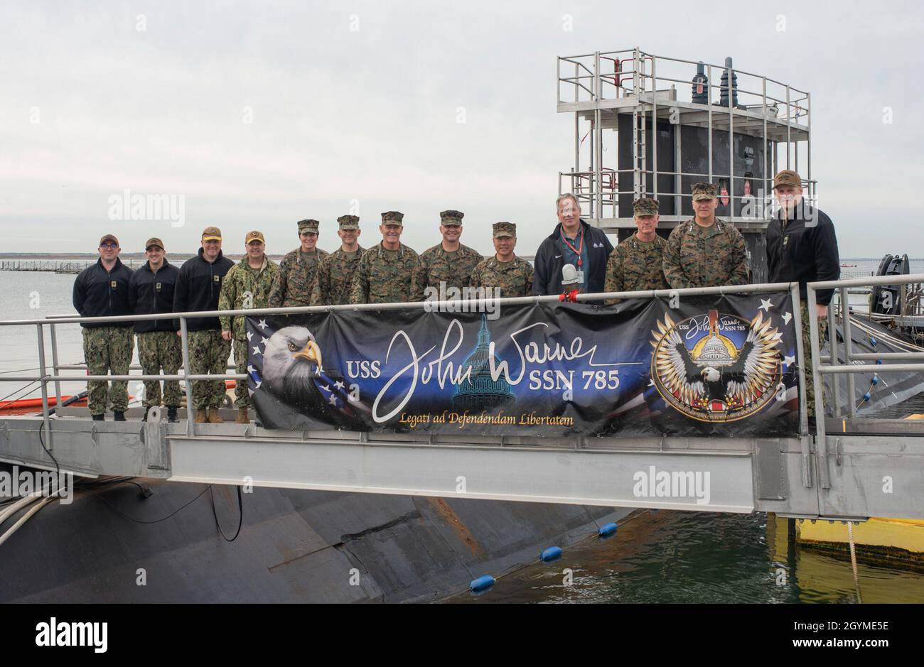 Cmdr. William Wiley, commanding officer of USS John Warner (SSN 785 ...
