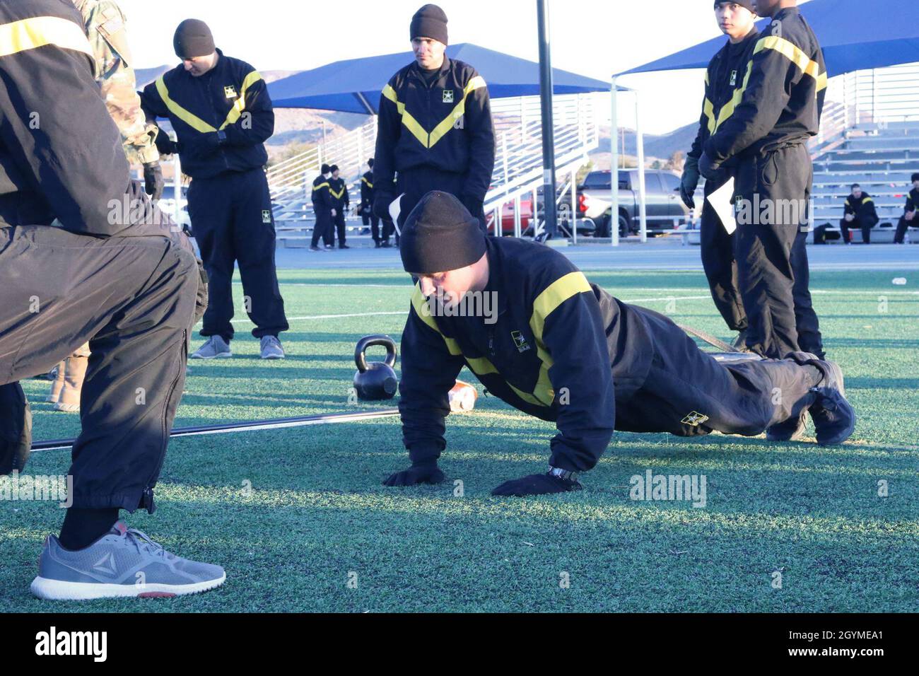 A Trooper executes a Hand Release Push-Up – Arm Extension during a ...