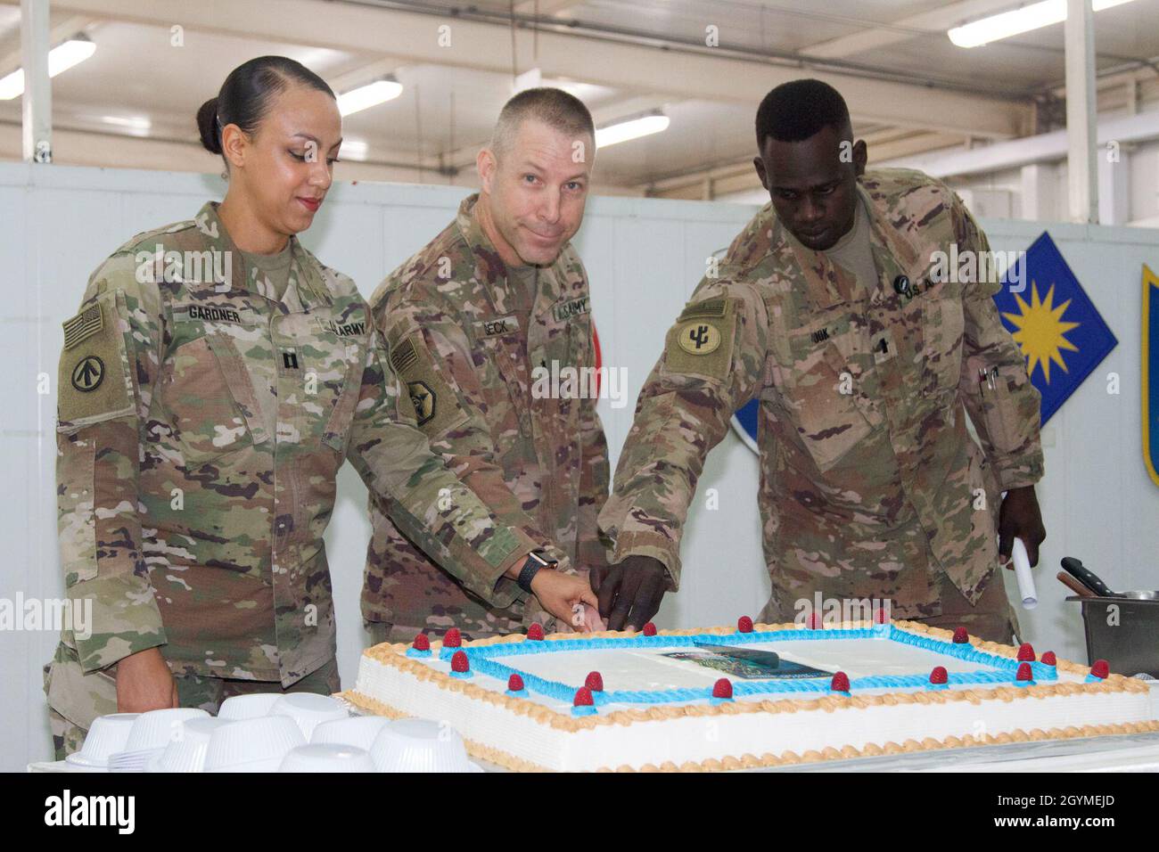 From left to right, Capt. Taralee Gardner, Brig. Gen. Howard Geck, and ...