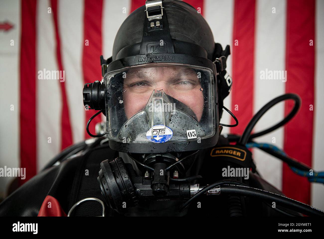 U.S. Coast Guard Chief Petty Officer David Partin is outfitted in his ...