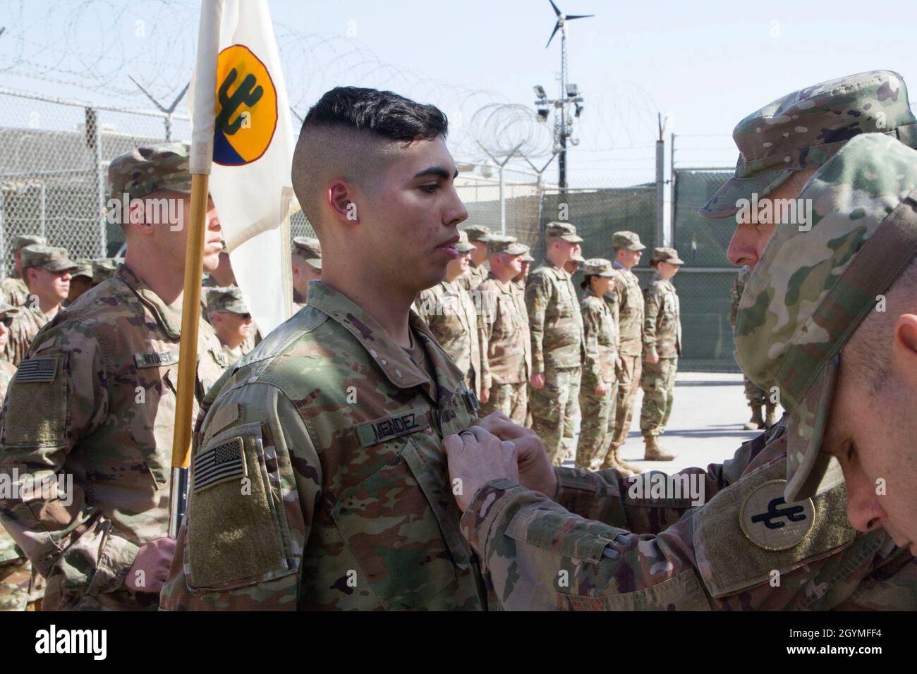Spc. Fernando Mendez gets promoted to Sgt. by Brig. Gen. Howard Geck ...