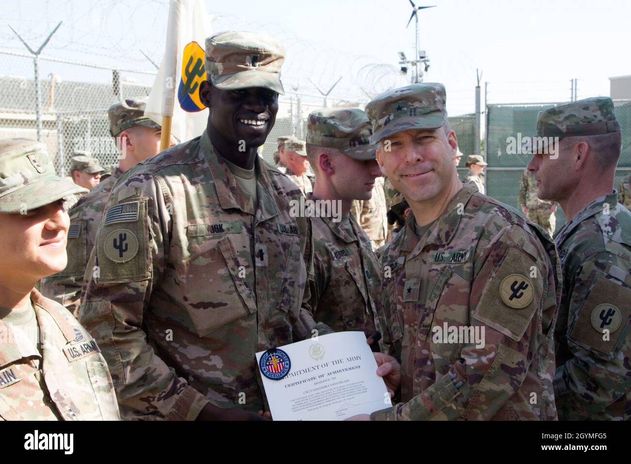 Brig. Gen. Howard Geck, commanding general, poses with 1st Lt. Dau Jok ...