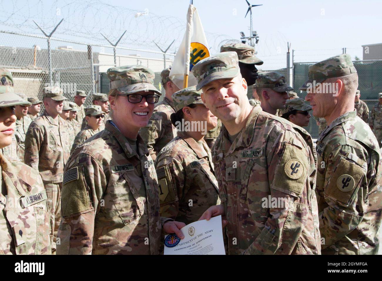 Brig. Gen. Howard Geck, commanding general, poses with Sgt. Julie ...