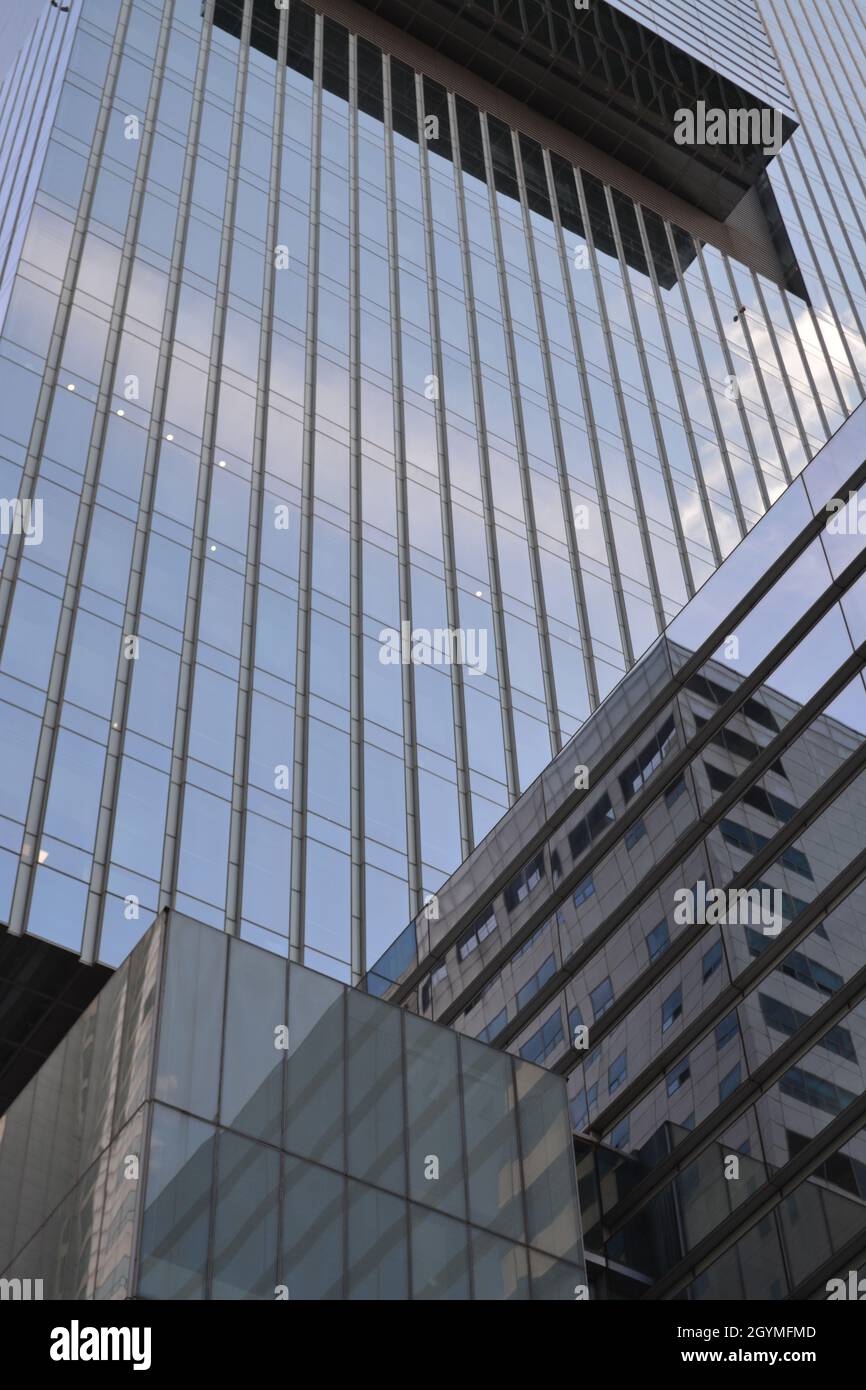 Flipped vertical shot of a modern high-rise office building Stock Photo ...