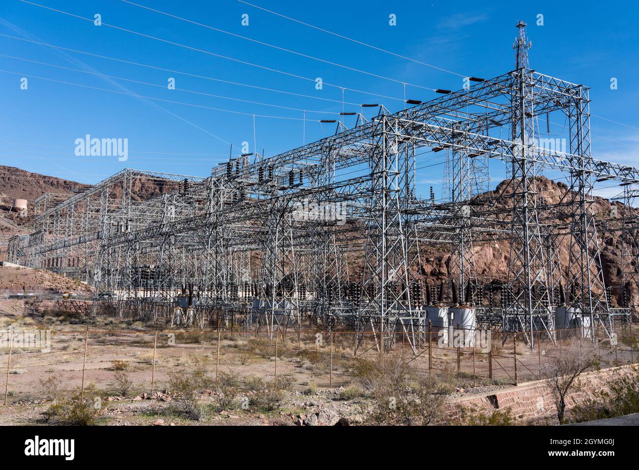 An electrical substation or switchyard for transmitting power from the ...