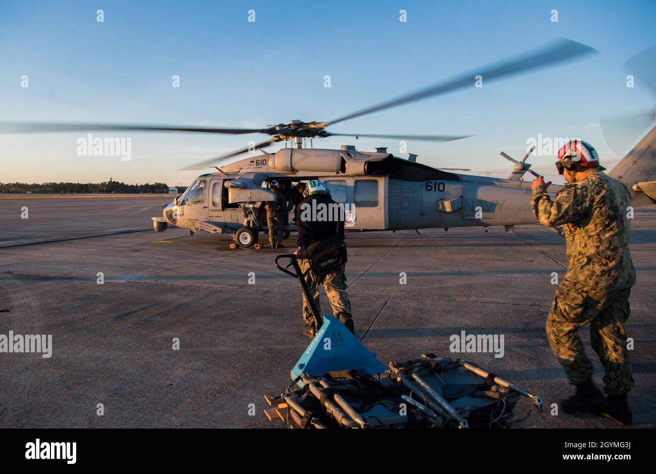 A U.S. Navy MH-60S Seahawk crew chief assigned to the Helicopter Sea ...